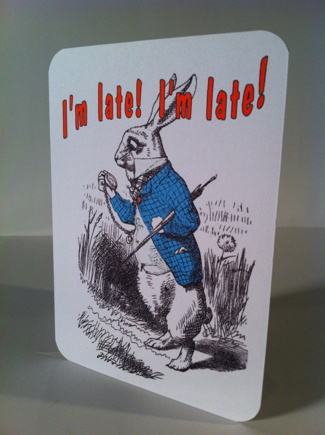 White Rabbit From Alice in Wonderland Proclaims I'm Late, Inside is "i ...