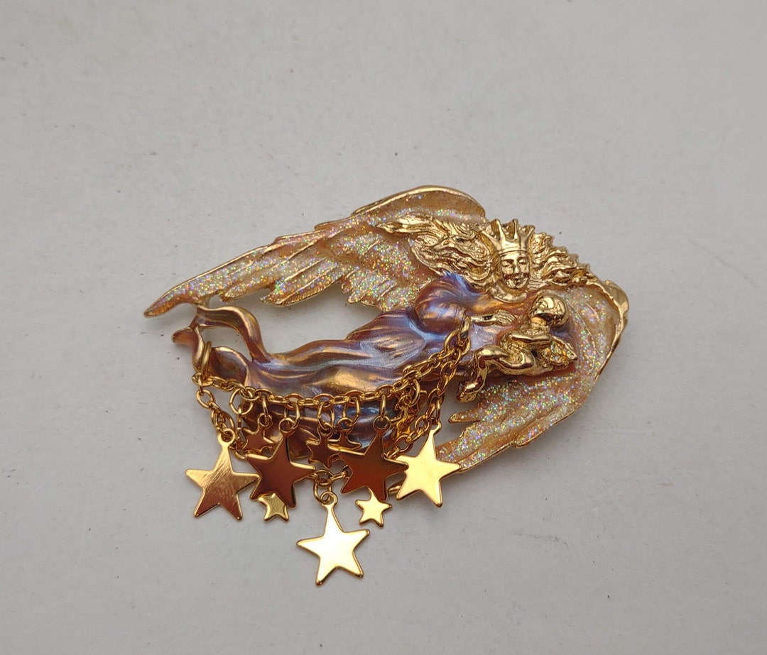 Kirks Folly Flying Guardian Angel With Baby Dangling Stars Dreamer ...