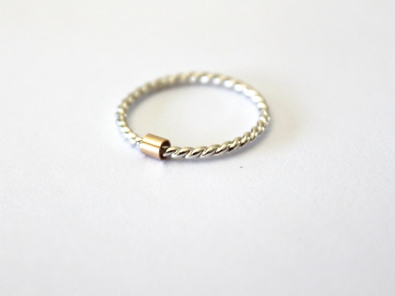 Twist and Slide Ring//Sterling silver ring with 14kt. gold | Etsy
