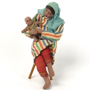 Mother and Child Figure - Vintage Cultural Mother Sitting on a Wooden ...