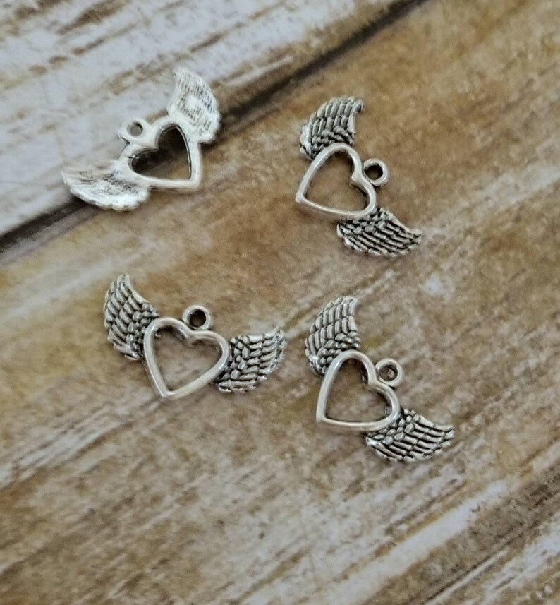 10 Little Heart Charms Flying Heart Charms Hearts With Wings - Etsy