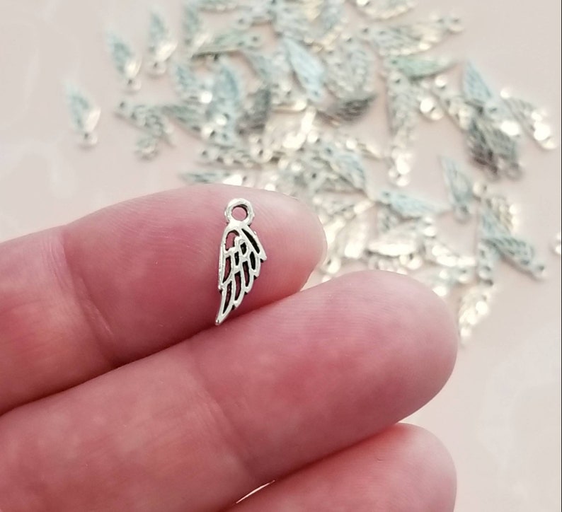 14 Tiny Filigree Wing Charms Mini Angel Wings Sweet Little | Etsy