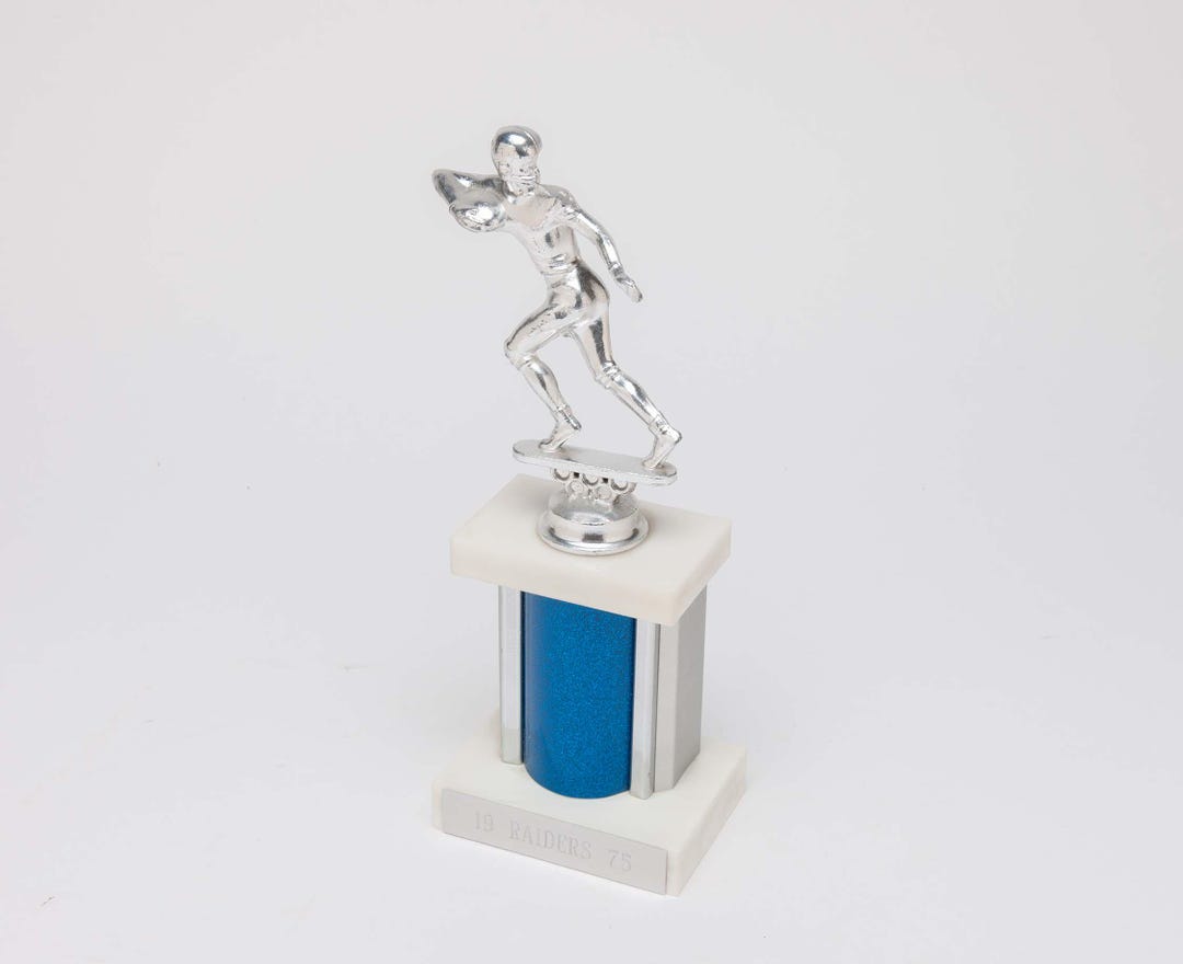 1970's FOOTBALL TROPHY - Metal Chrome Football Player on Blue Column - Etsy