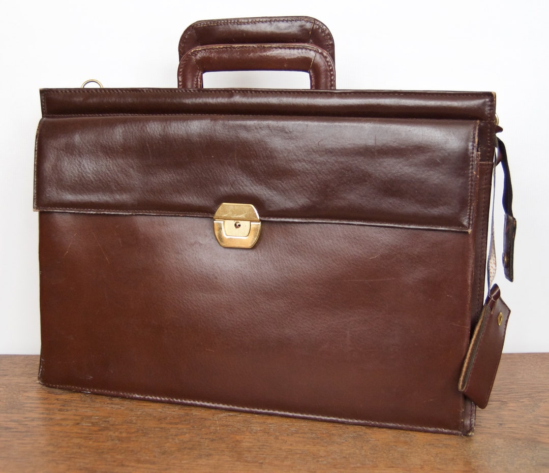 1980s Brown Leather Briefcase With Retractable Handles & Front Gold ...
