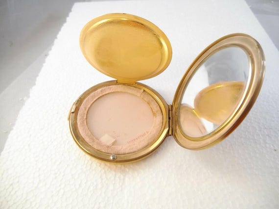 Stratton Compact, Gold Tone Swirl Leaves, with a Blac… - Gem