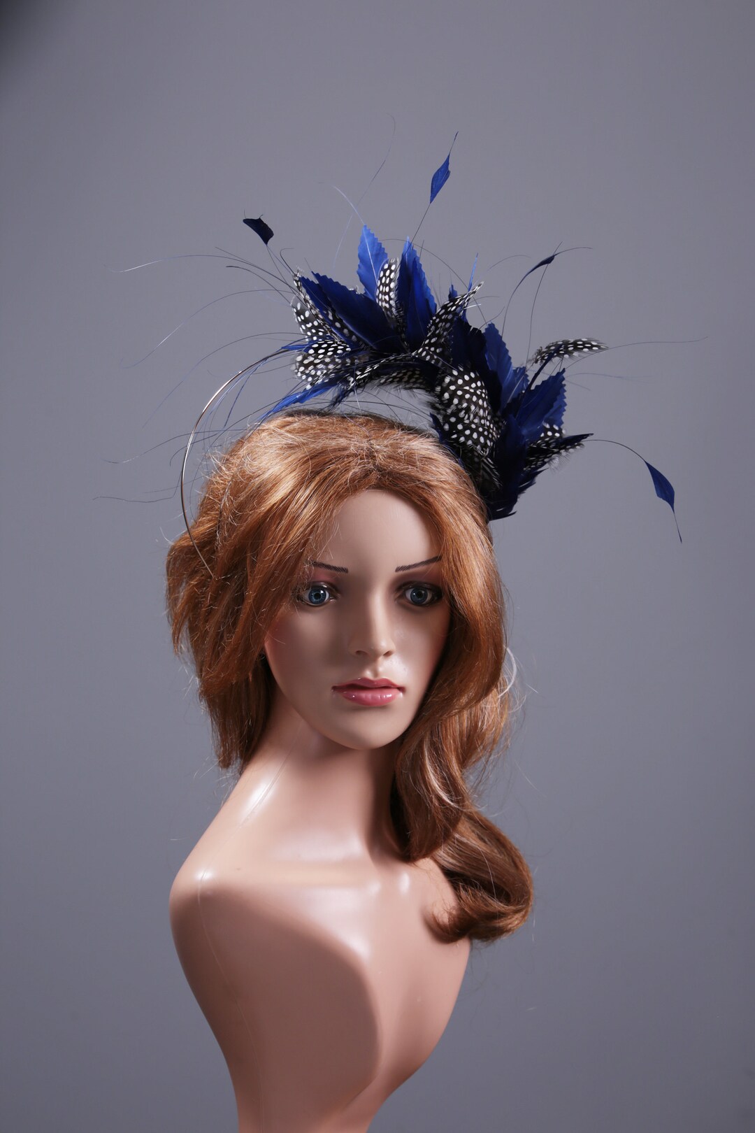 Royal Blue and Black Spotty Feather Mount on a Silver Halo Crown ...