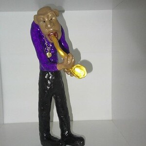 Hand Sculpted Clay Statue/figurine of "jazz Man" Playing a Saxaphone ...