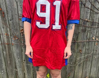 Vintage 90's Russell Athletic Red and Blue Long Buffalo Vintage 90's Russell Athletic Red and Blue Long Buffalo