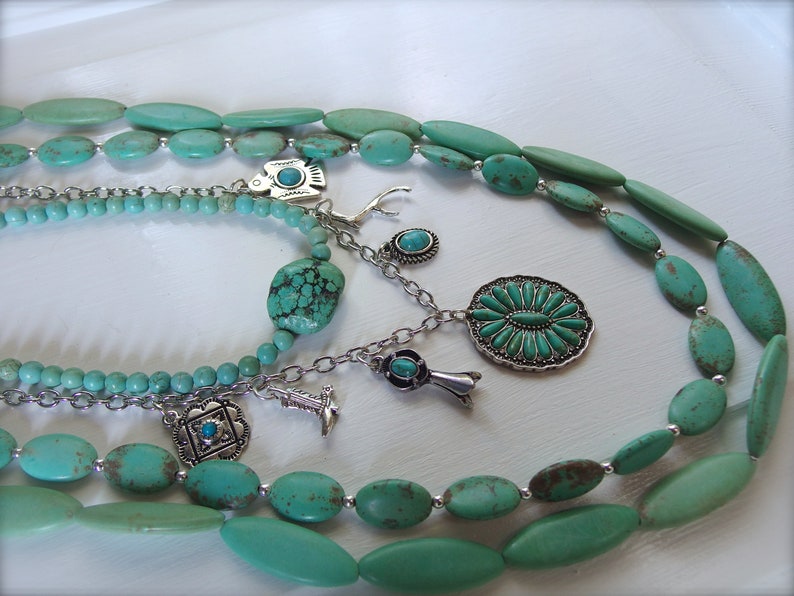 ENOLA 5, Beautiful Four Strand Turquoise and Silver Charm Necklace ...