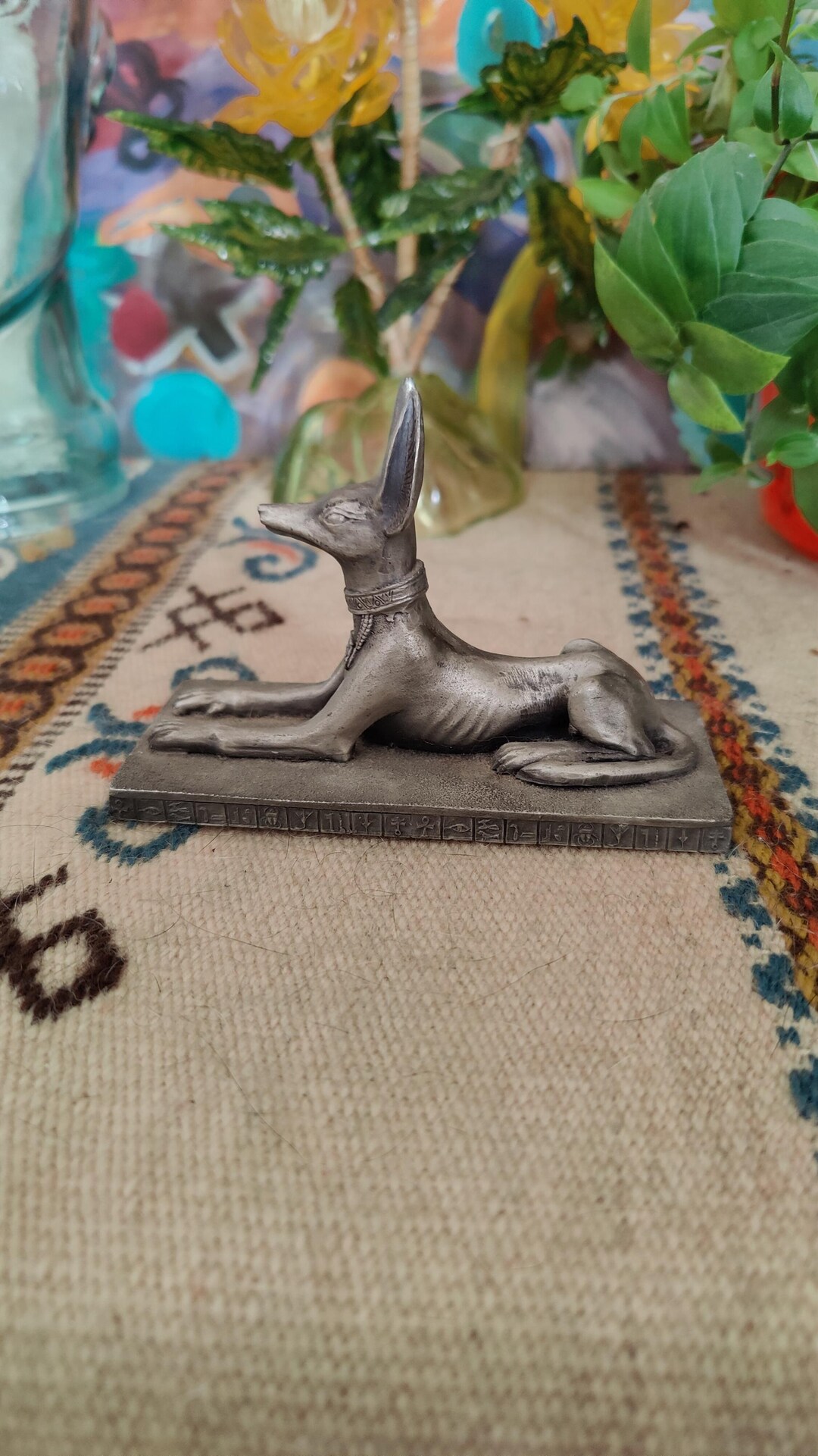 Egyptian God Anubis Metal Statue on Base Laying on Hieroglyphic Images ...