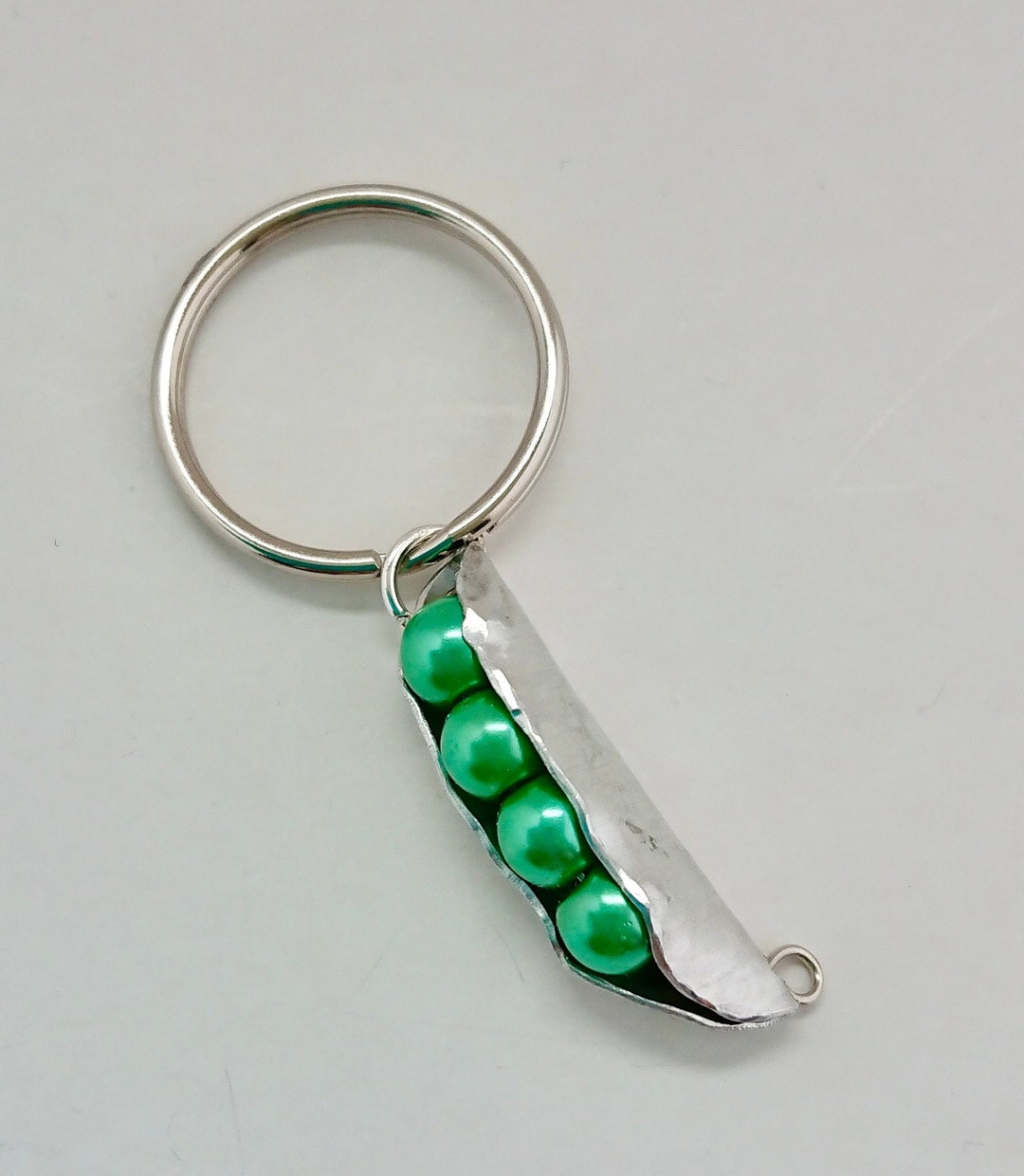 Silver Up-cycled Aluminium Peas in a Pod Keychain. - Etsy