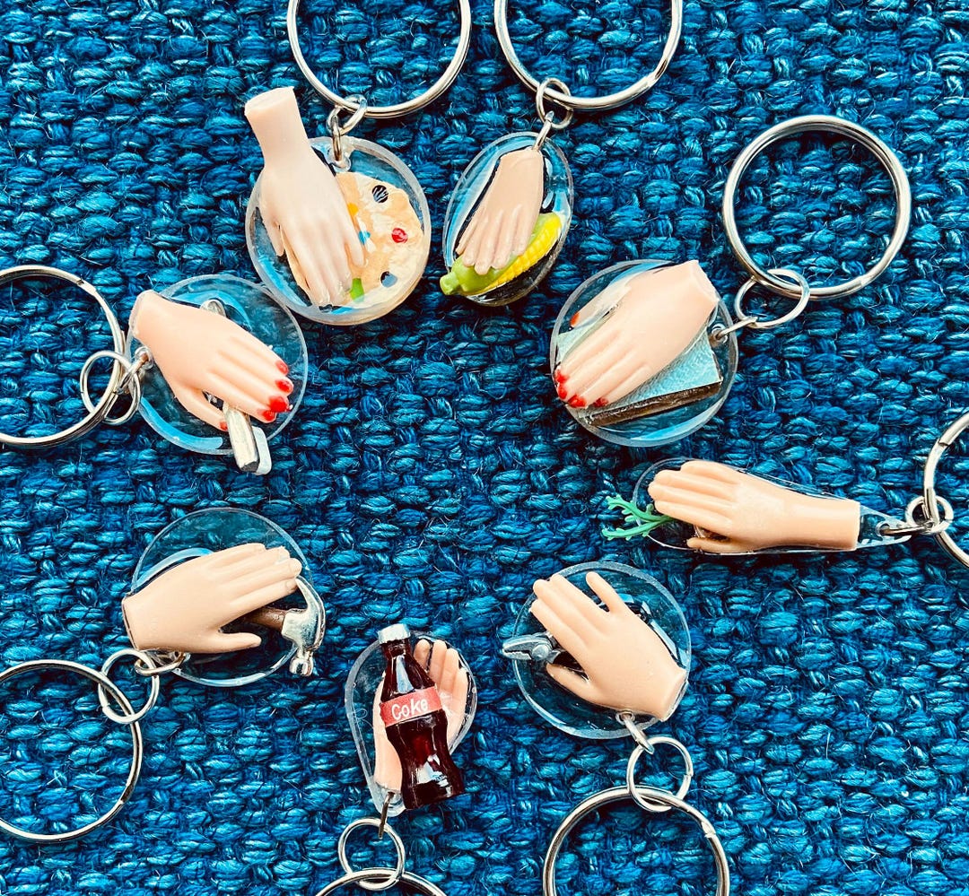 Hand Holding Keychains Assorted. - Etsy