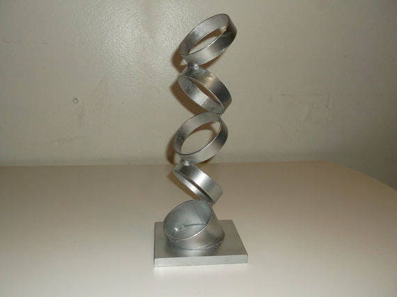 Metal Sculpture of Rings | Etsy