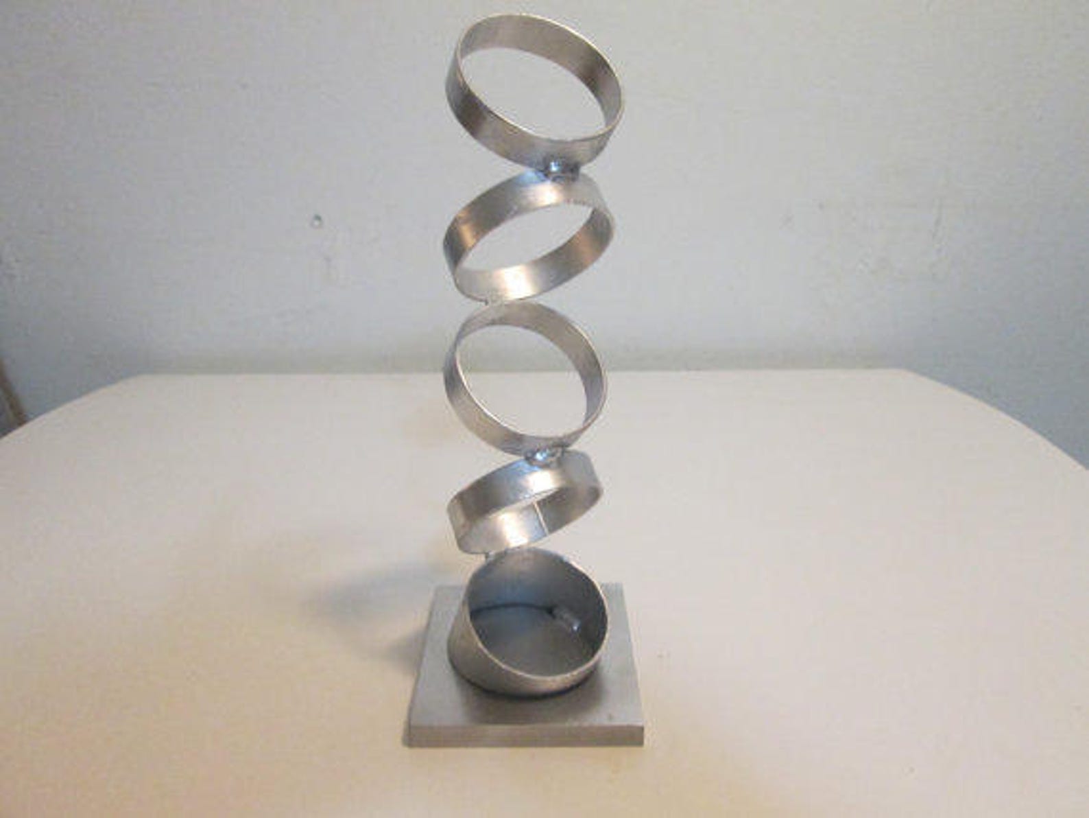 Metal Sculpture of Rings - Etsy