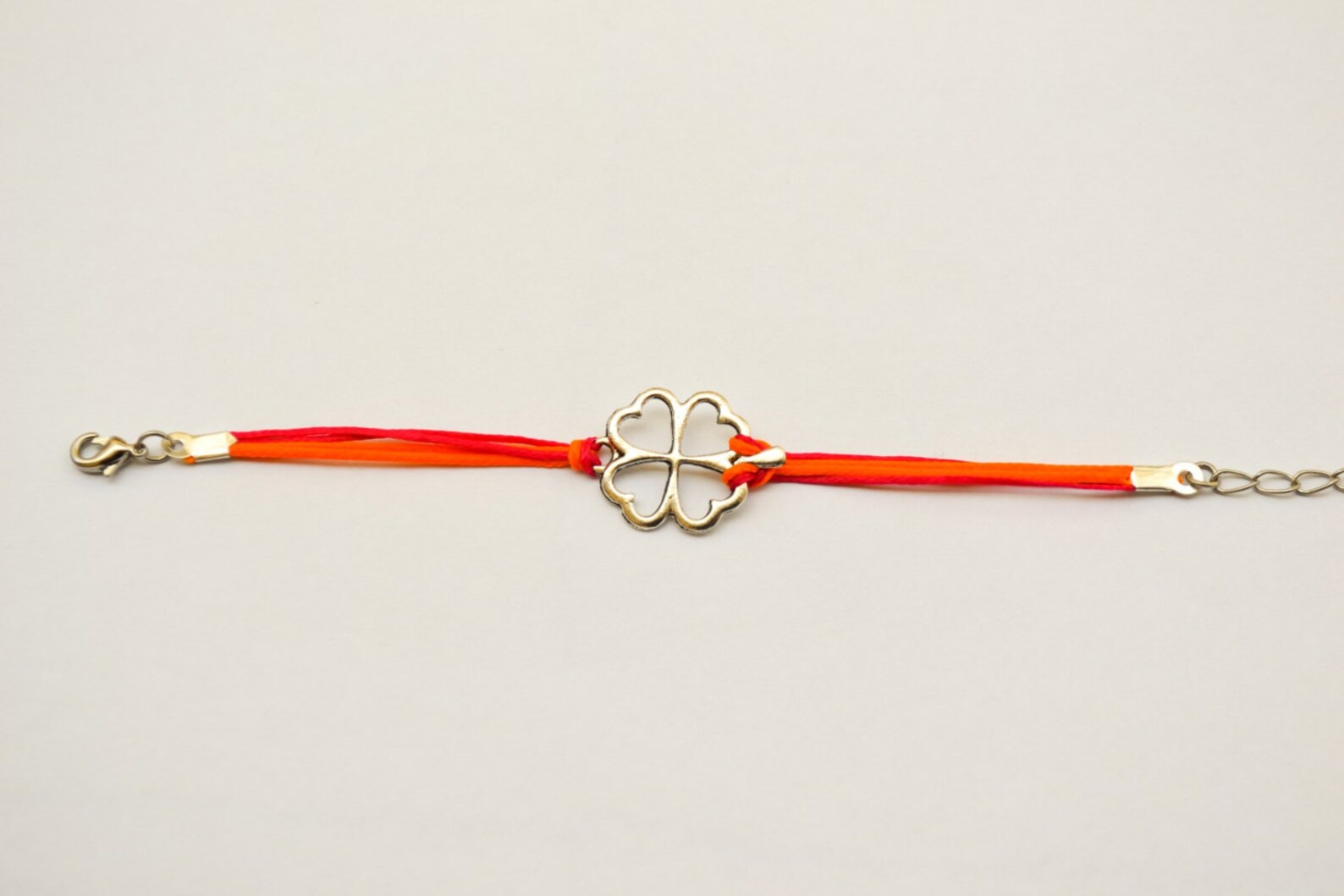 Clover friendship bracelet for girls pink and orange cords | Etsy