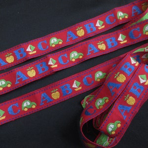 ABC Jacquard Ribbon Braid, Bright Primary Colors on Red Woven Ribbon ...