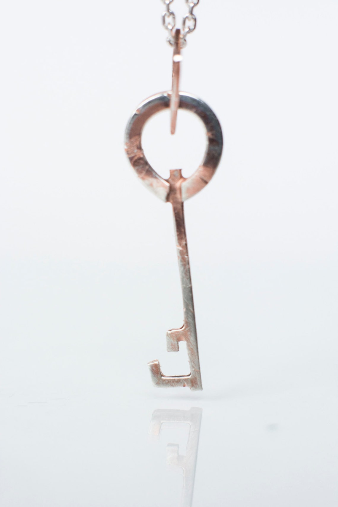 Dwarf Key with scratches and copper rust Pendant | Etsy