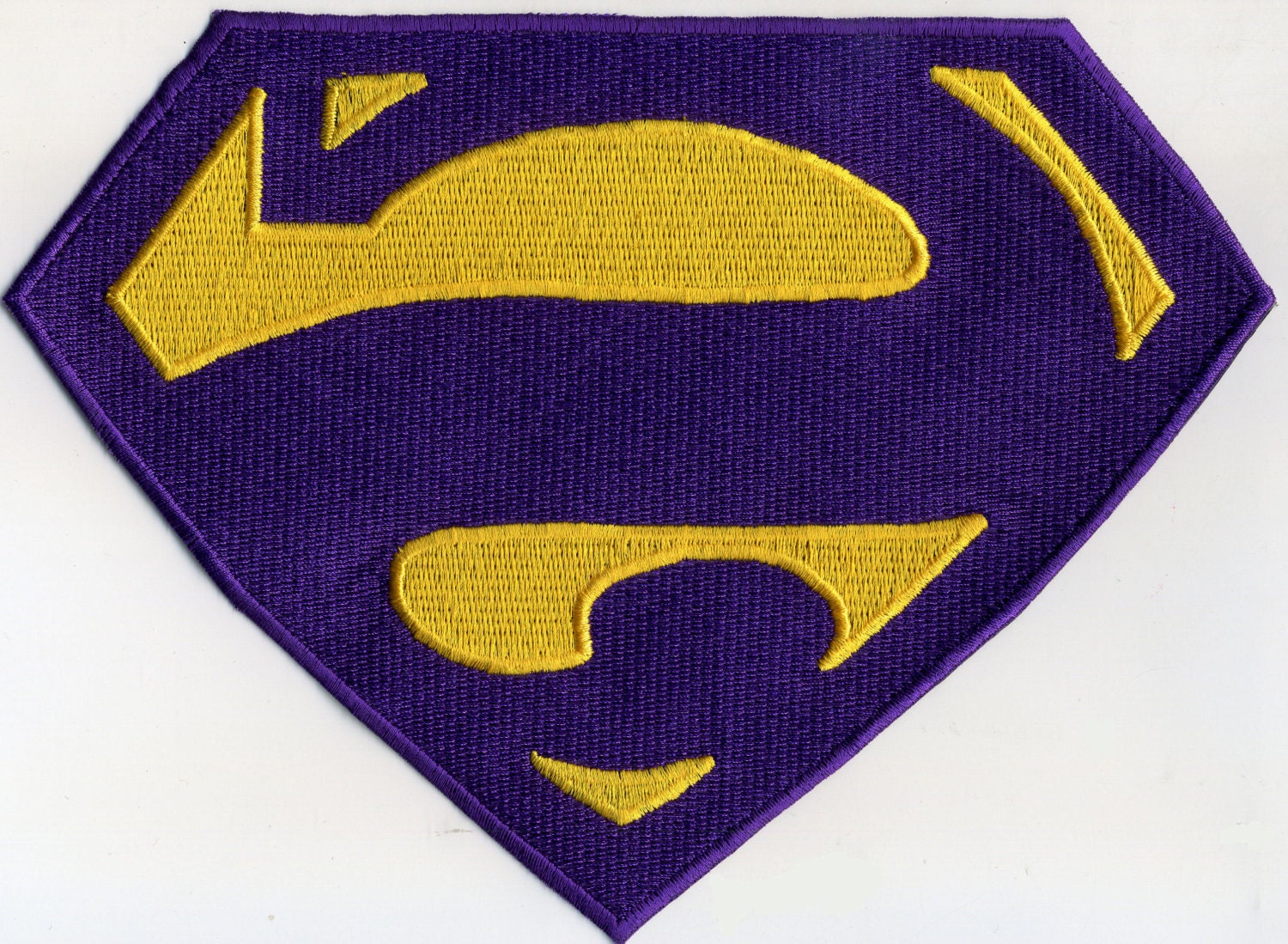 Yellow Superman Logo