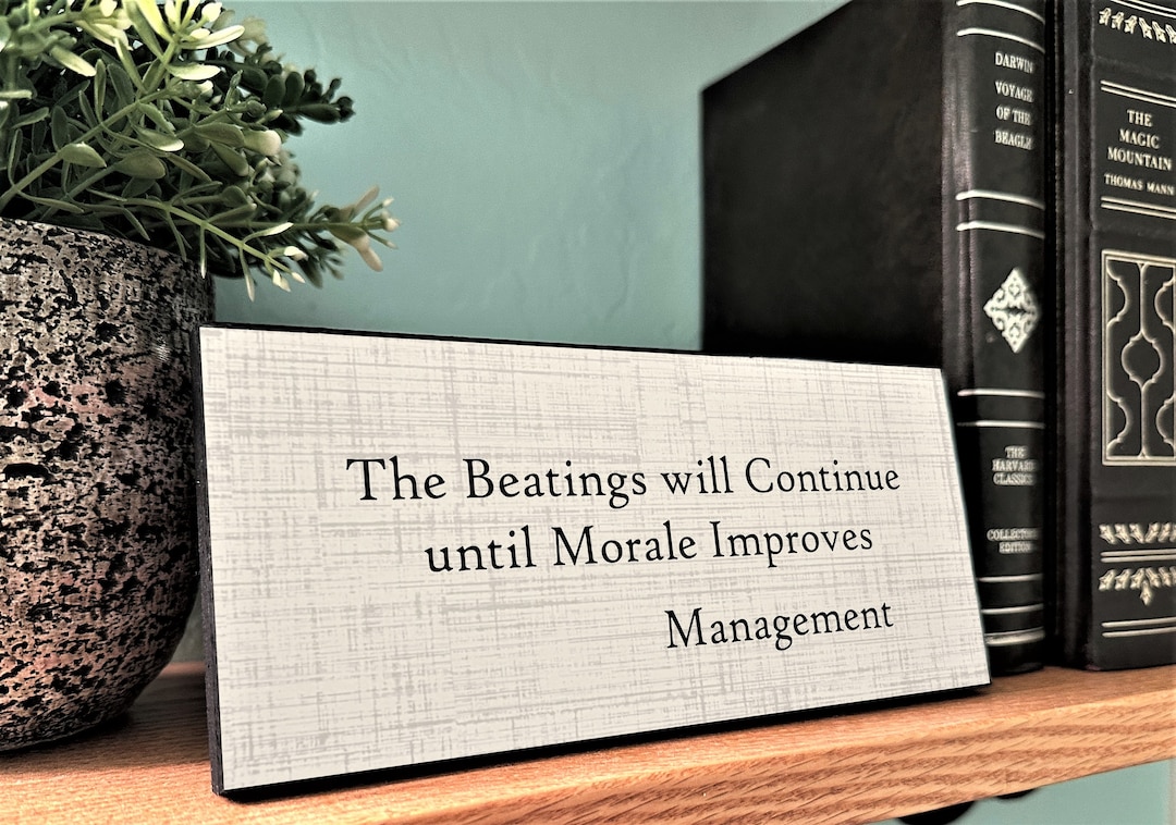 The Beatings Will Continue Until Morale Improves Sign, Book Shelf ...