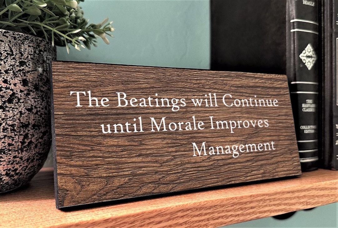 The Beatings Will Continue Until Morale Improves Sign, Book Shelf ...