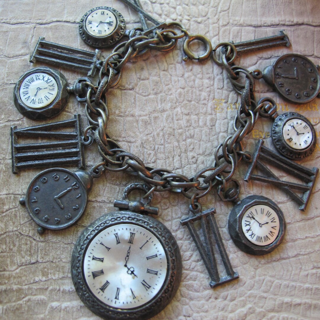 An "art" Designer Signed Clocks, TIME, Roman Numbers, Gunmetal Tone ...