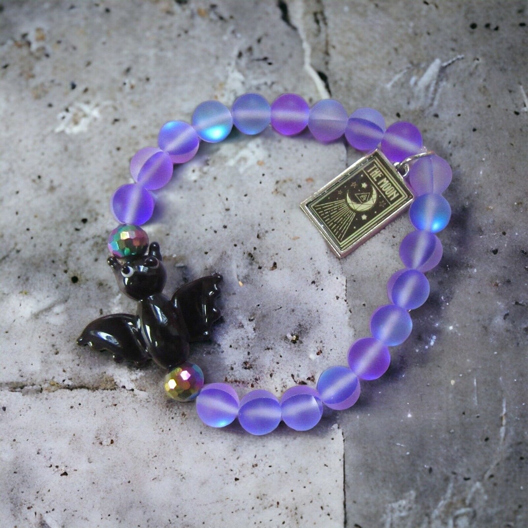 Whimsical Bat Halloween Bracelet With Frosted Purple Beads: A Spooky ...