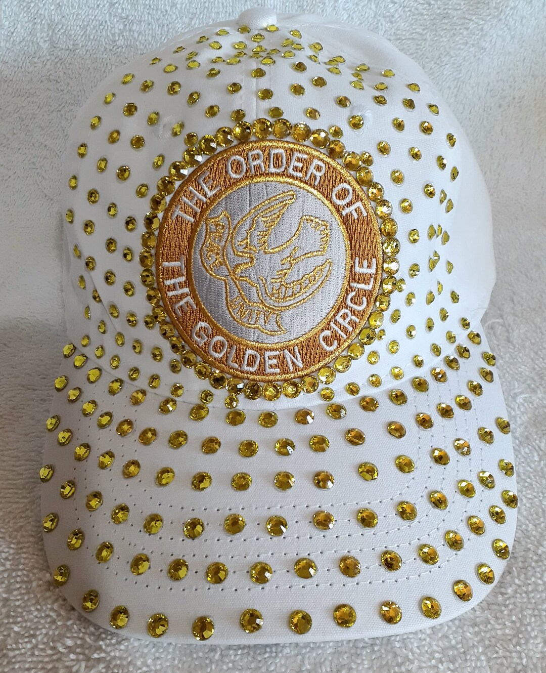 Order of the Golden Circle Logo Emblem Ball Cap Embellished With Gold ...