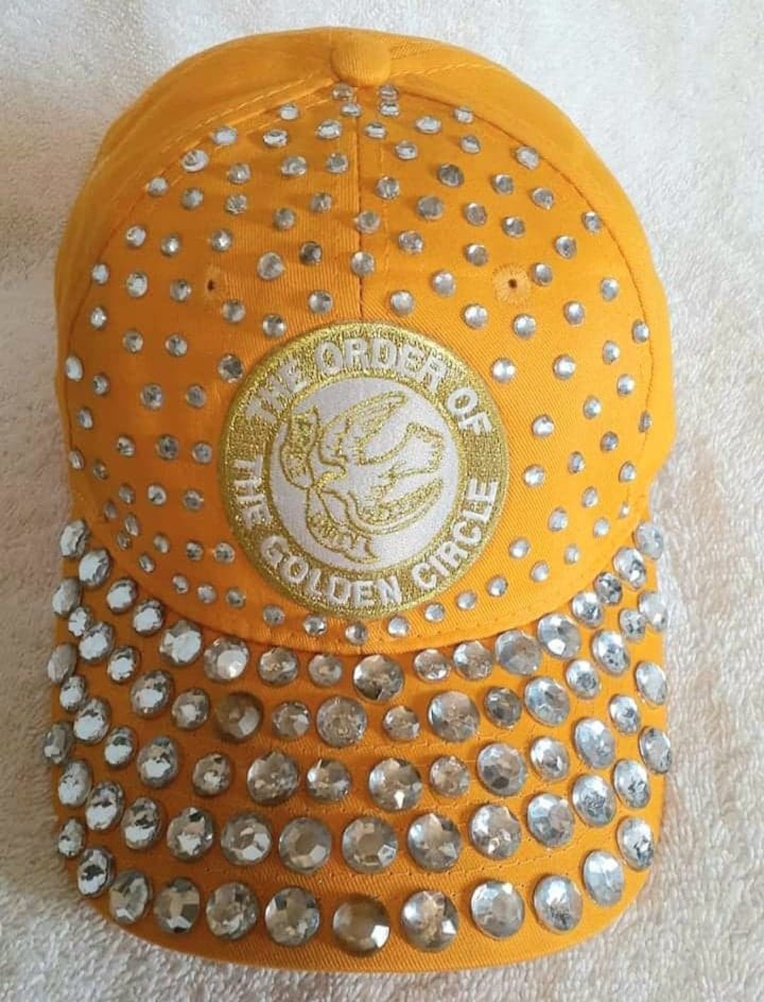 Order of the Golden Circle Logo Emblem Ball Cap Embellished With Clear ...