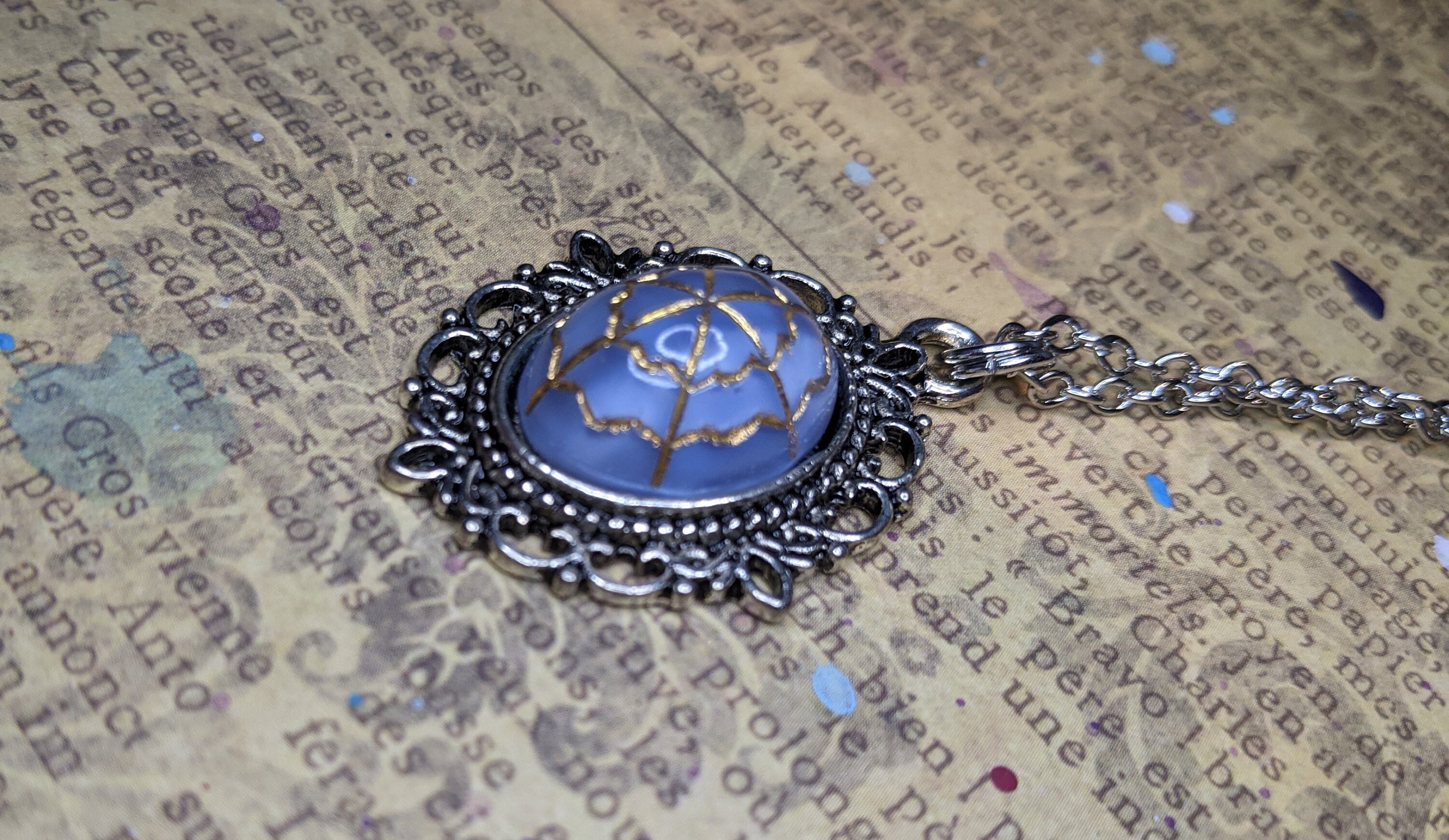 Itsy Bitsy Spider. Blue and Gold Iridescent Spider Web Patterned Lucite ...