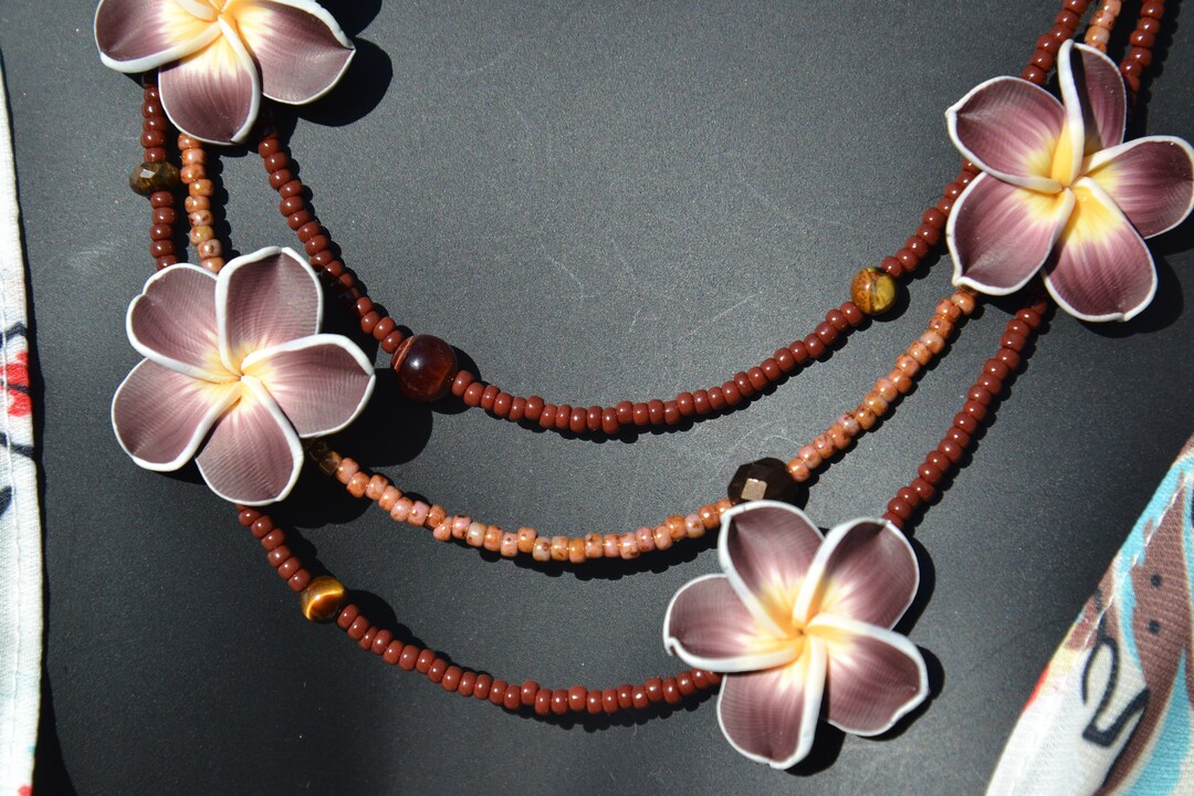 A Piece of Hawaii Plumeria Triple Strand Necklace in Taupe, Brown ...