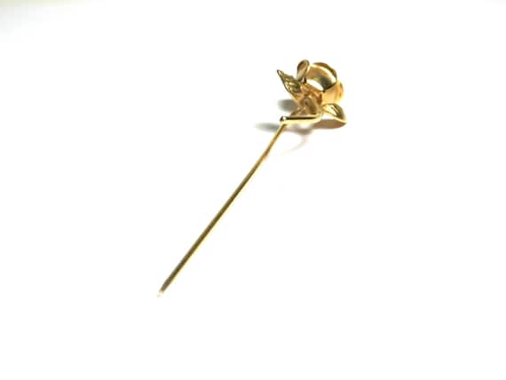 Gold rose pin store