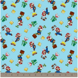 Nintendo® Super Mario Mario Toss Light Blue Cotton by the Fat Quarter ...