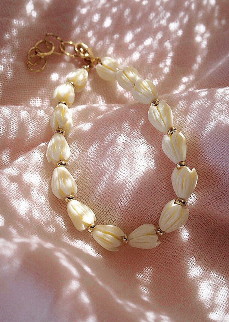 Gold and Carved Pikake Bracelet - Aloalo - Etsy