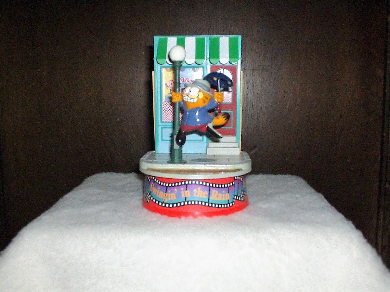 Vintage Enesco Garfield Swingin' in the Rain Action Musical Music Box ...