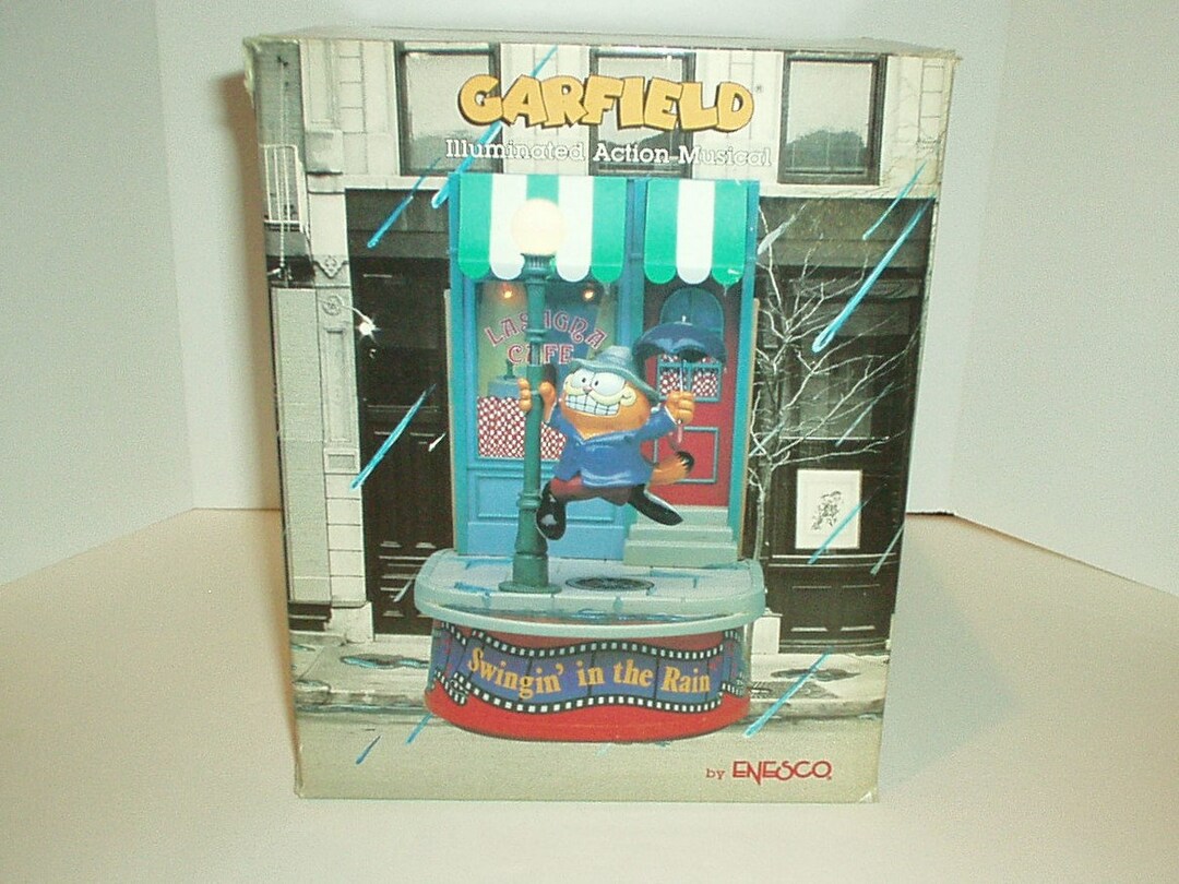 Vintage Enesco Garfield Swingin' in the Rain Action Musical Music Box ...