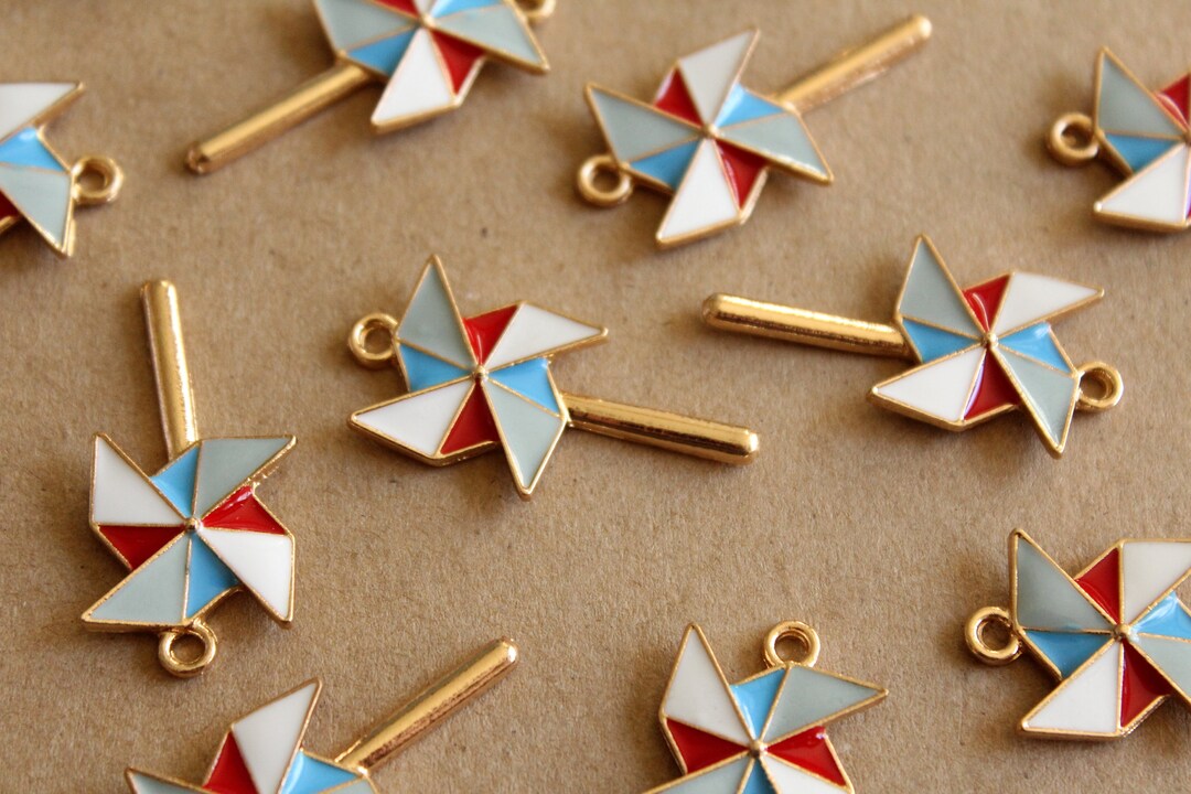 4 Pc. Red, White, Blue, Mint Green and Gold Enameled Pinwheel Charms ...