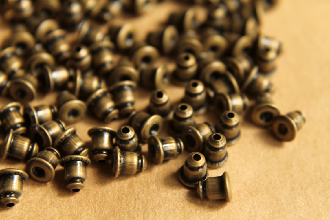 100 Pc. Antique Bronze Plated Bullet Earnuts, Nickel Free | FI-159 - Etsy
