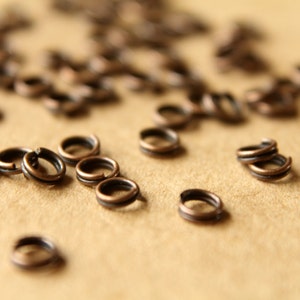 200 Pc. 4mm Antique Copper Split Rings, 22 Gauge | FI-141 - Etsy
