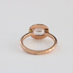 1.01 Ct. Oval Light Peach Sapphire Milgrain Bezel Halo Ring in 14K Rose ...