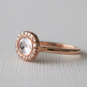 1.01 Ct. Oval Light Peach Sapphire Milgrain Bezel Halo Ring in 14K Rose ...