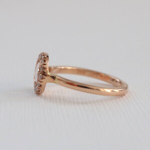 1.01 Ct. Oval Light Peach Sapphire Milgrain Bezel Halo Ring in 14K Rose ...