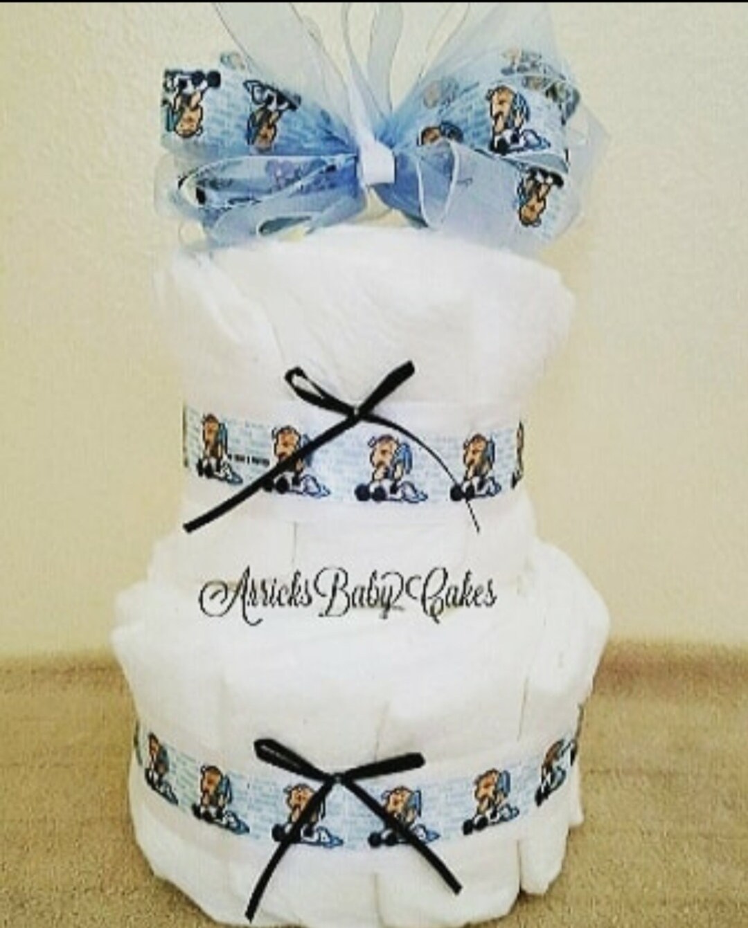 The blue Snoopy 2 Tier Baby Boy Diaper Cakearricksbabycakesbaby Shower ...