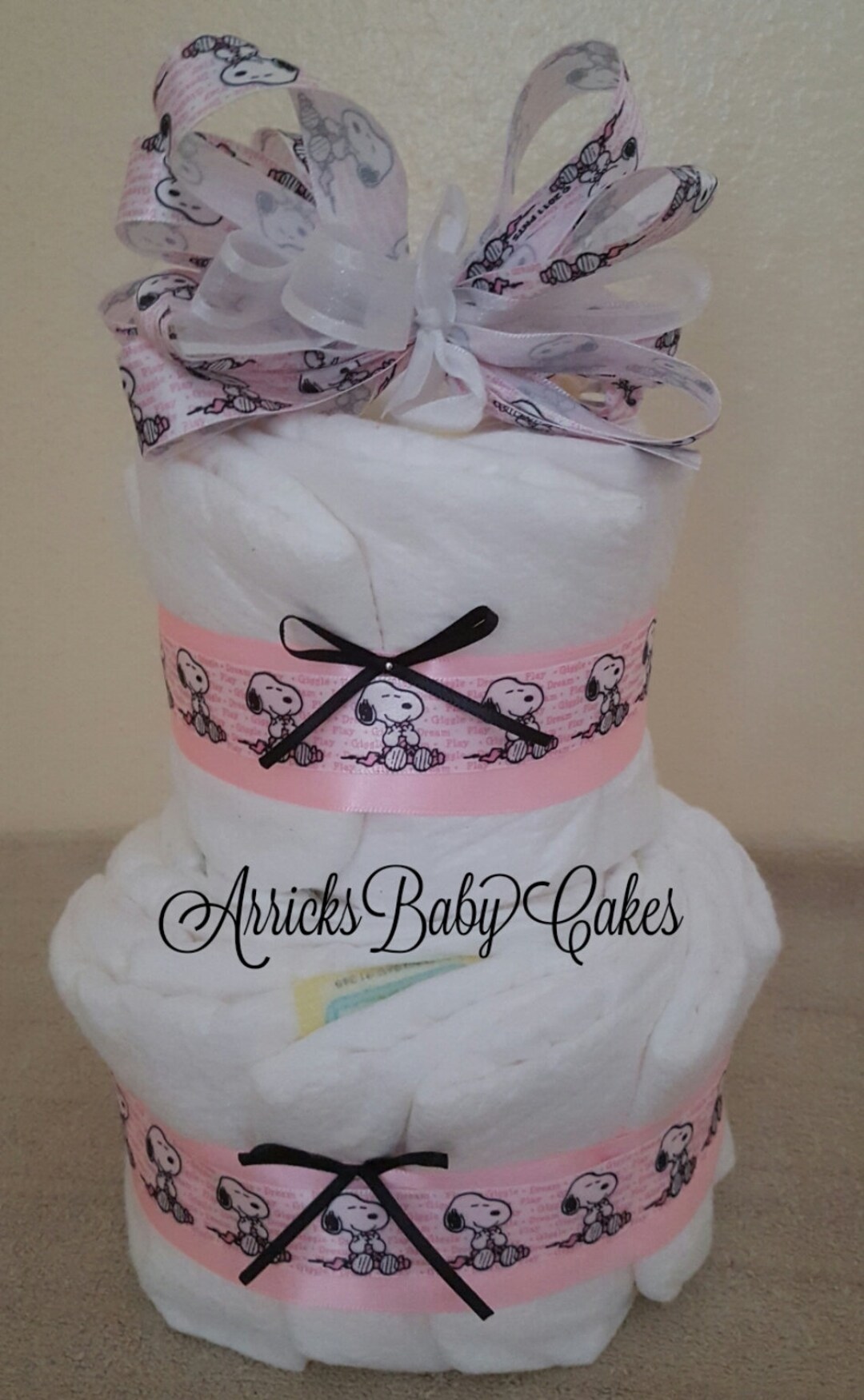 The pink Snoopy 2 Tier Baby Girl Diaper Cakearricksbabycakesbaby Shower ...