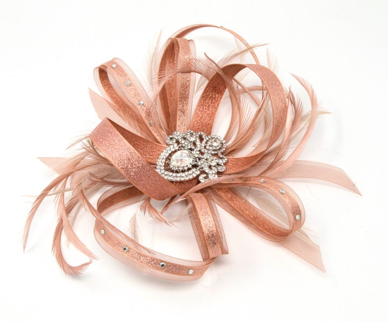 Shimmering metallic rose gold fascinator with diamante brooch. | Etsy