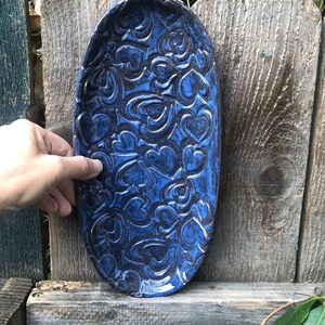 Handcrafted Oval Platter in Deep Blue Glaze, Adorned With an Assortment ...