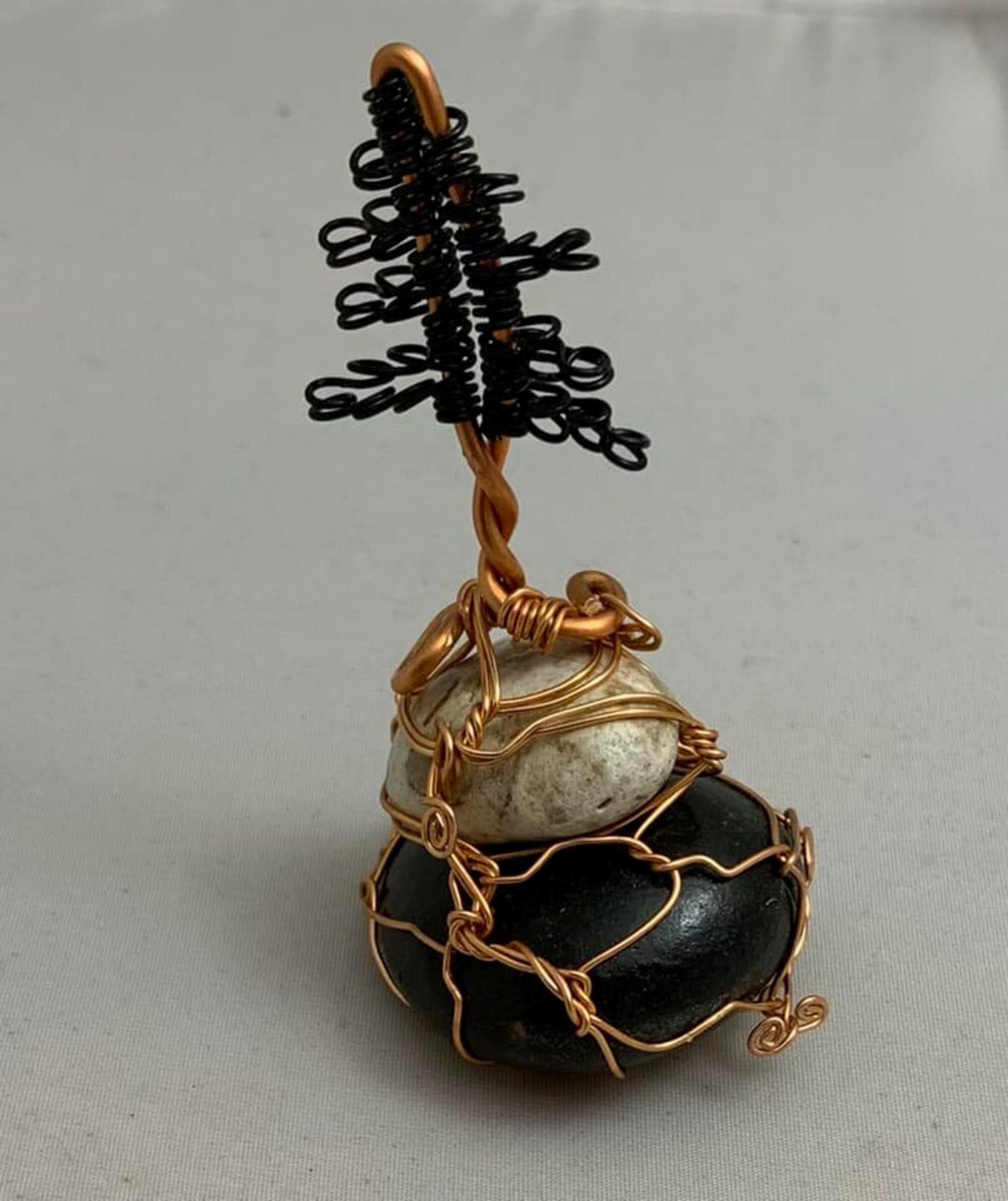 Handmade Wire Pine Tree Sculpture on Lake Superior Michigan USA Stones ...