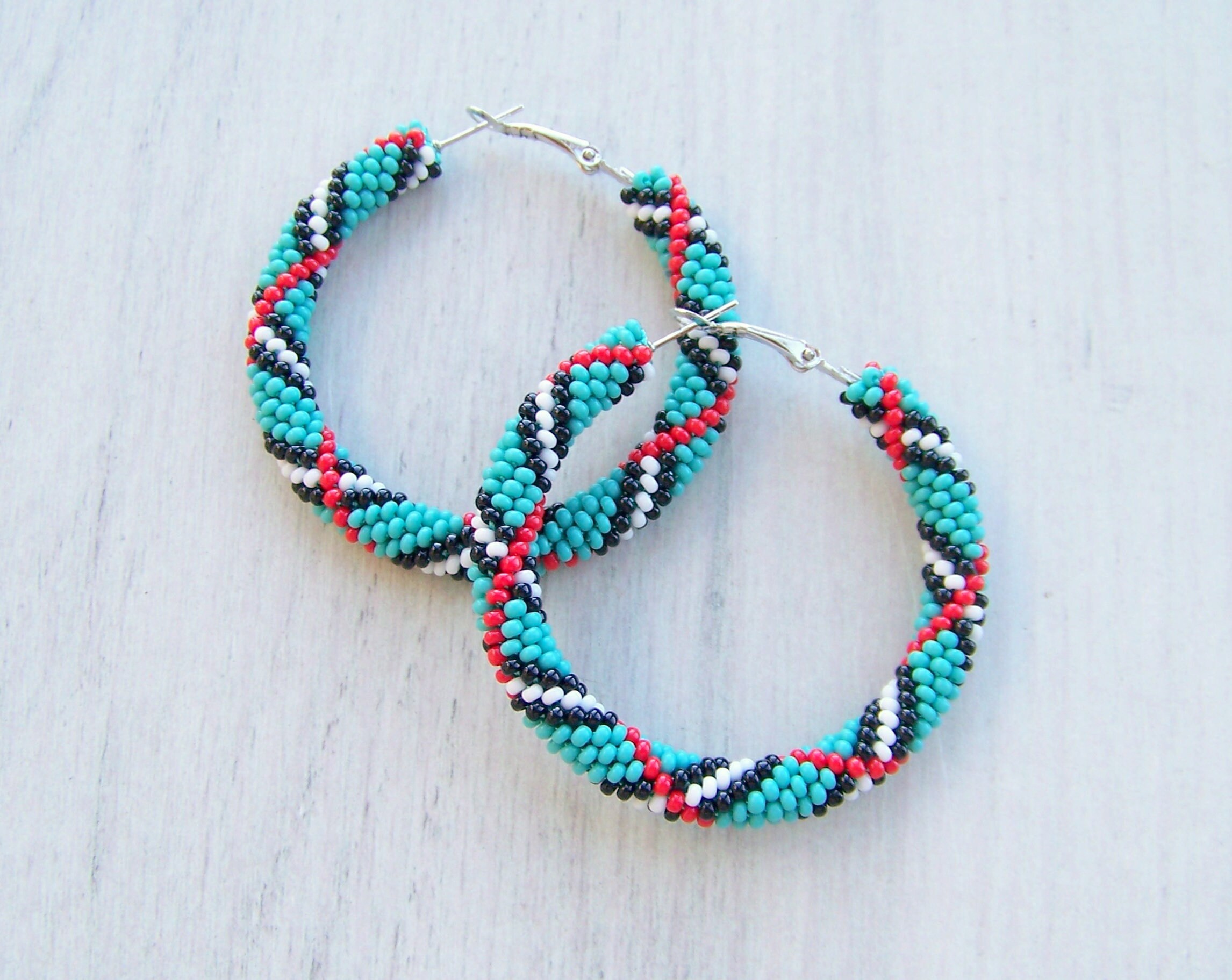 Beaded hoop earrings in beige black red white Beadwork | Etsy
