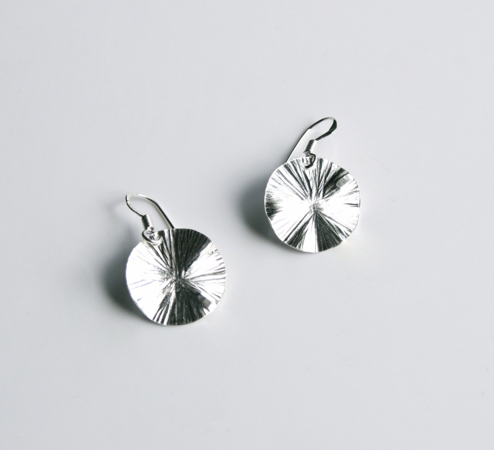 Mini Shimmering Disc Earrings Are Small but Have a Striking Design and ...
