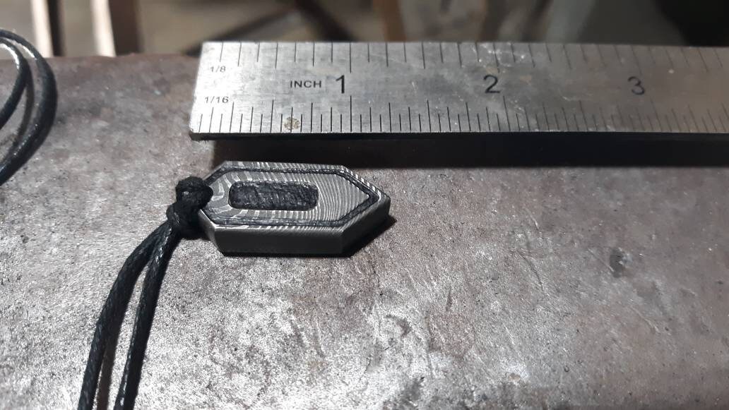 Madalorian Beskar Steel Iron Heart Pendant - Etsy