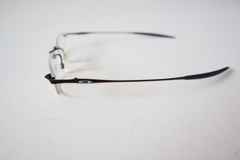 Oakley Small Eyeglasses Split Thread Polished Brown Rimless Frame 4919 ...